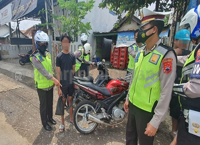 Polisi Buru Motor Berknalpot Racing